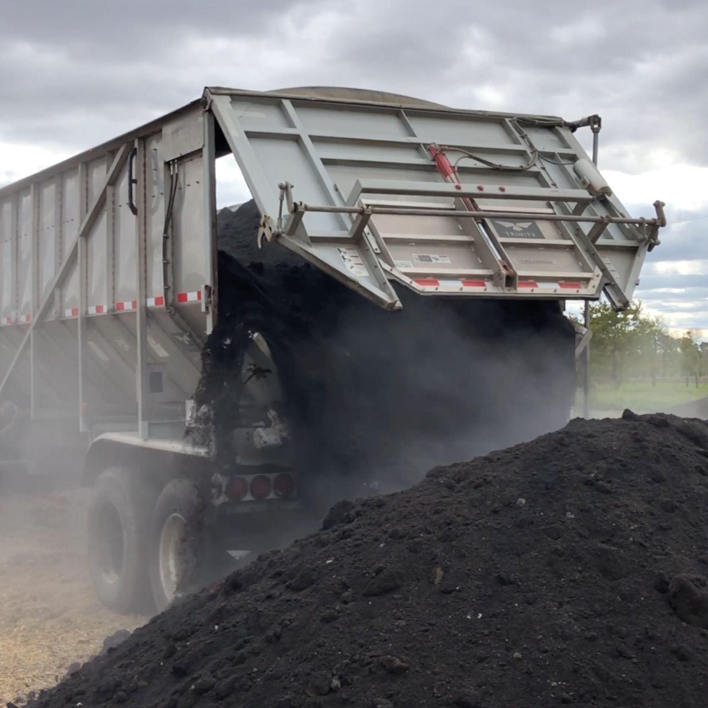 Biosolids Hauling Made Easy | Efficient Unloading Solutions | Trinity